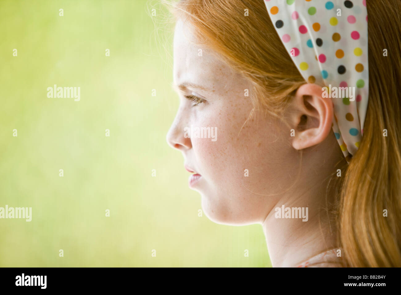 Close-up of a girl thinking Stock Photo - Alamy