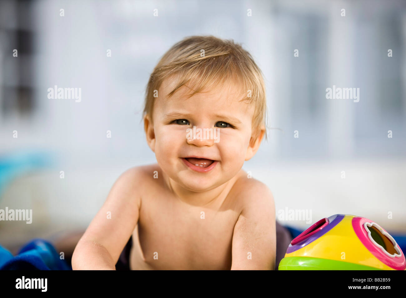 Portrait of a baby boy smiling Stock Photo - Alamy