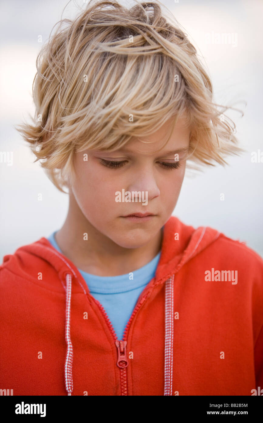 Close-up of a boy thinking Stock Photo - Alamy