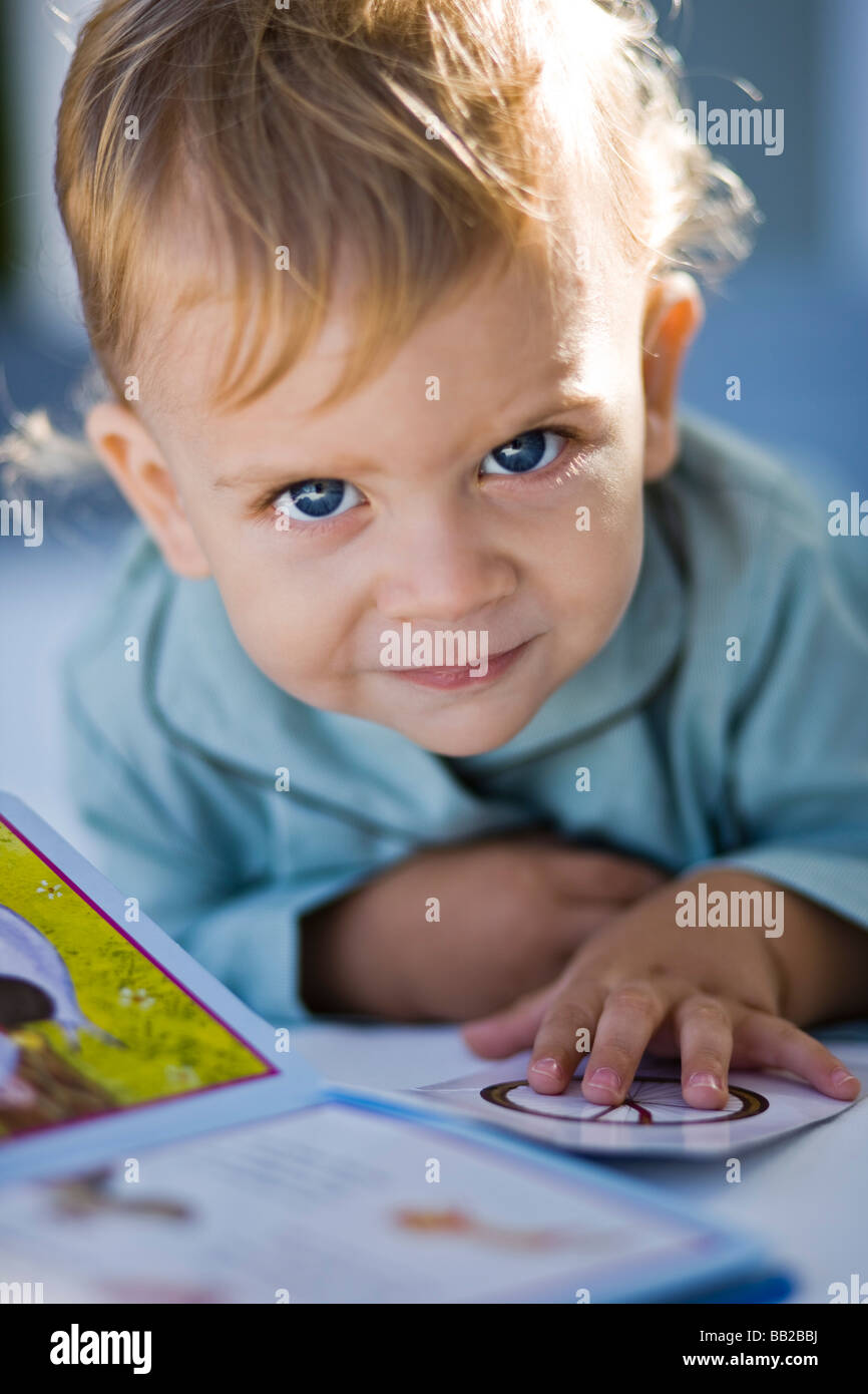 Infant caucasian boy reading hi-res stock photography and images - Alamy