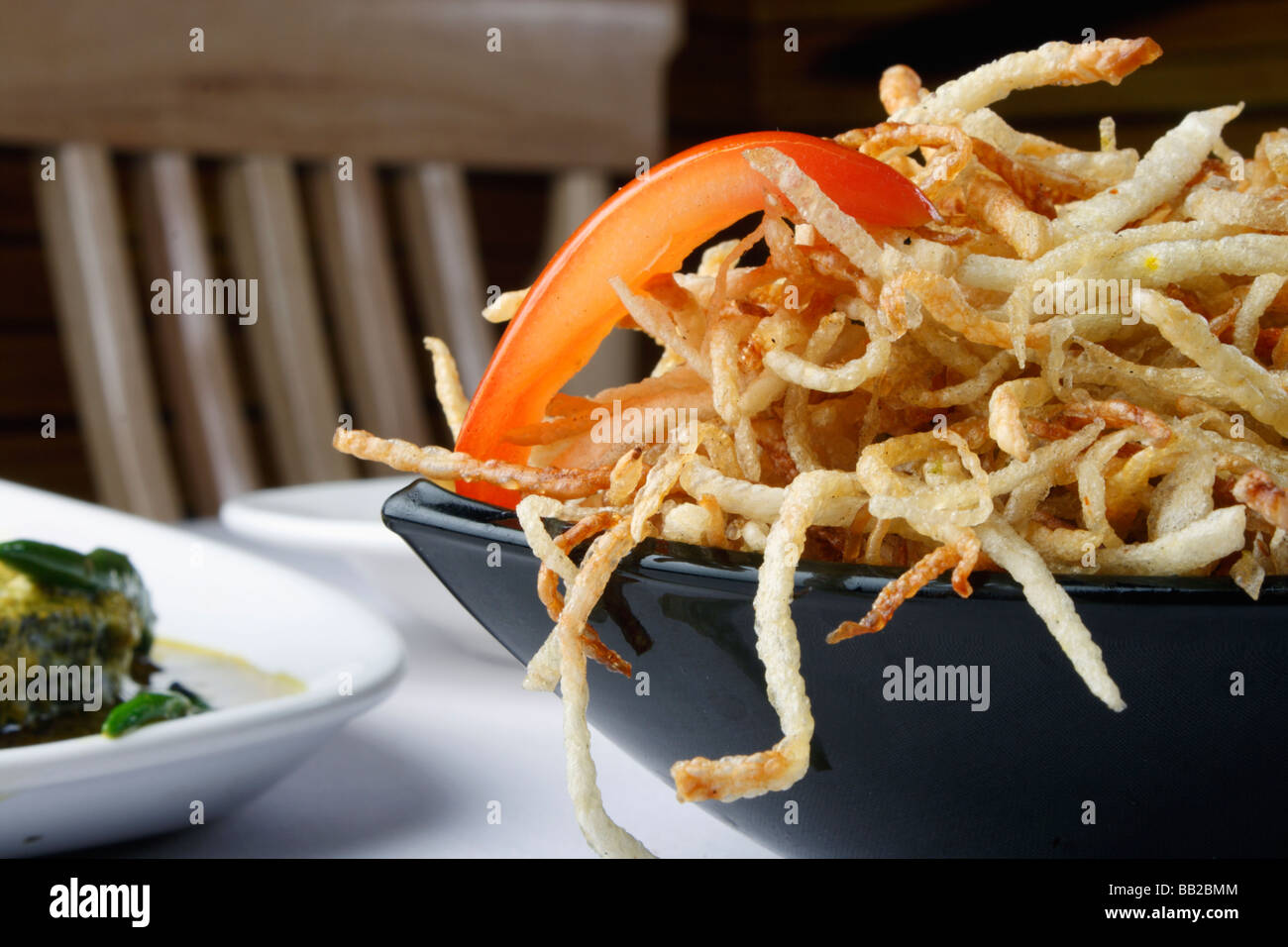 Alu bhaja is a crispy potato fry from Bengal Stock Photo - Alamy