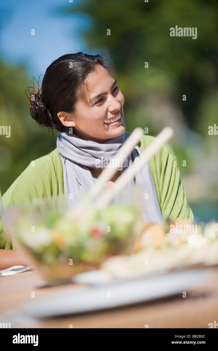 Woman having lunch Stock Photo - Alamy