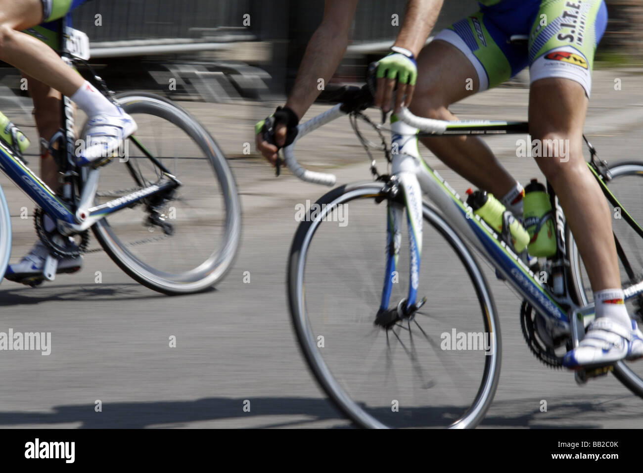 professional bike riders in road street race in city town Stock Photo ...