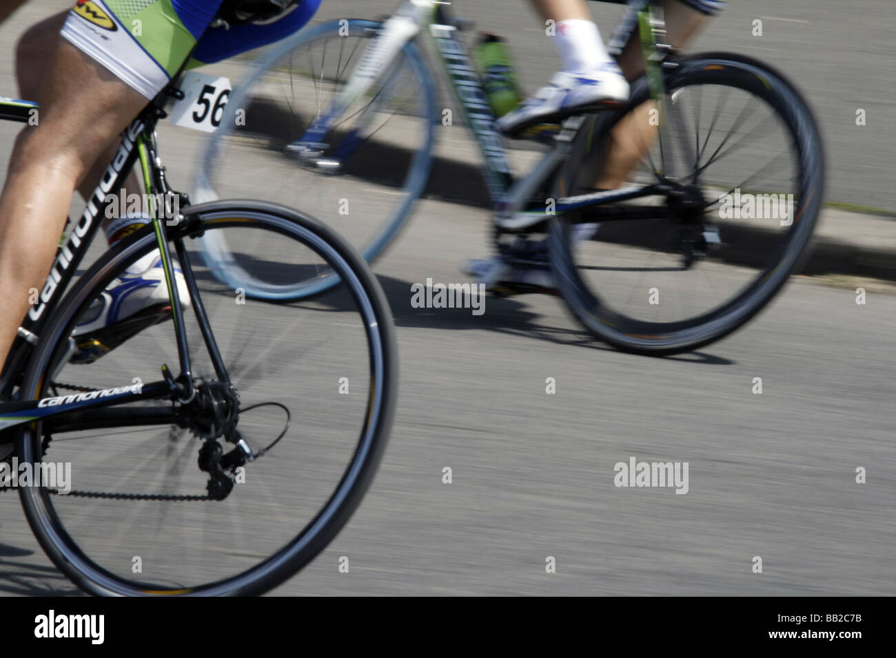 professional bike riders in road street race in city town Stock Photo ...