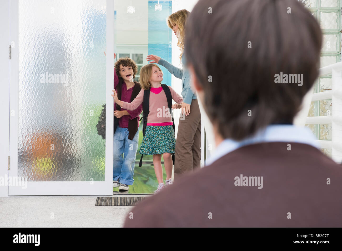 Children leaving for school Stock Photo - Alamy