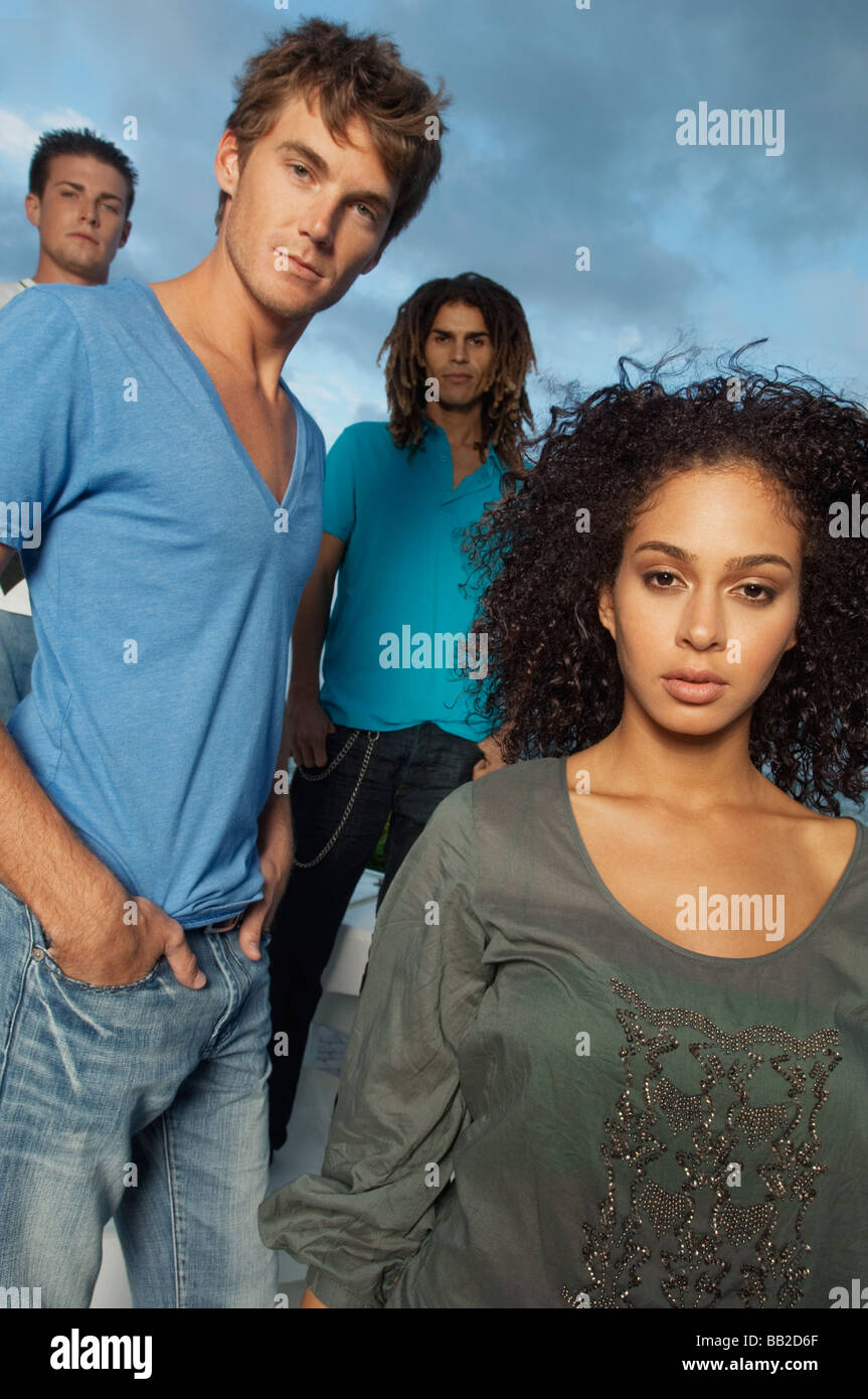 Portrait of four friends standing together Stock Photo - Alamy