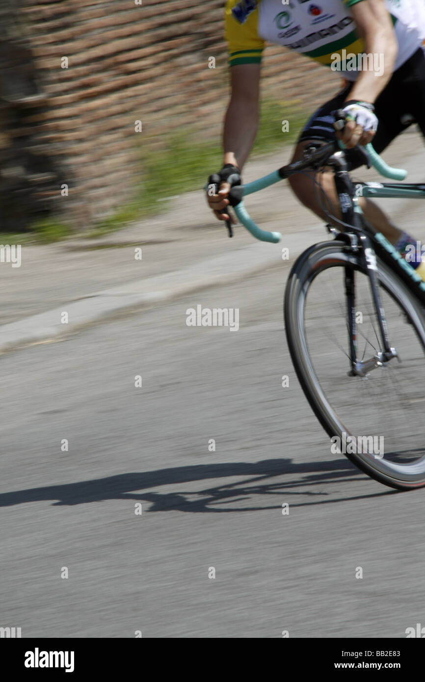 professional bike rider in road street race in city town Stock Photo ...