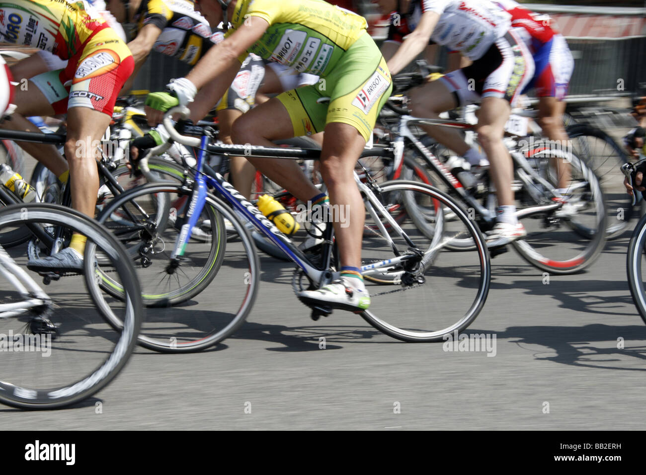 professional bike riders in road street race in city town Stock Photo ...