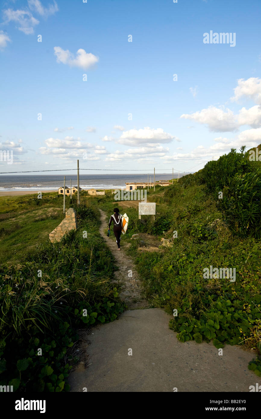 China, Zhoushan Prefecture, Shengsi Islands, Sijiao Island. Surfer ...