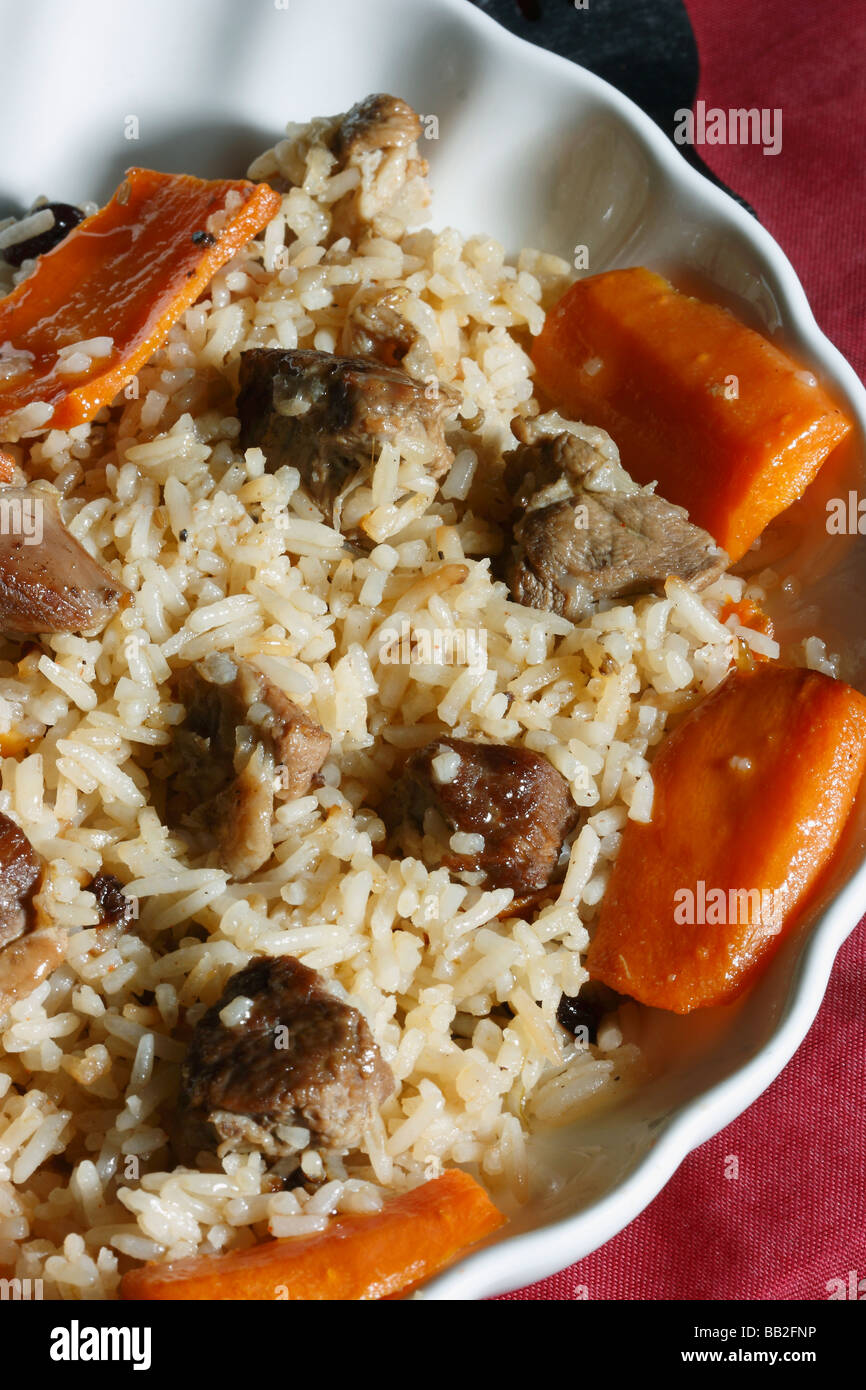 Qabili Pilau is a rice preparation made with lamb, carrots and raisins ...