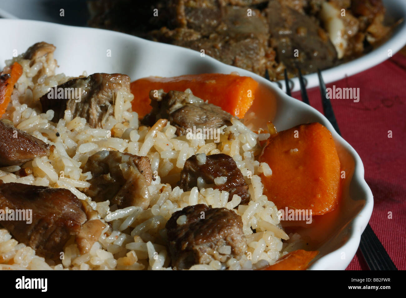 Qabili Pilau is a rice preparation made with lamb, carrots and raisins ...