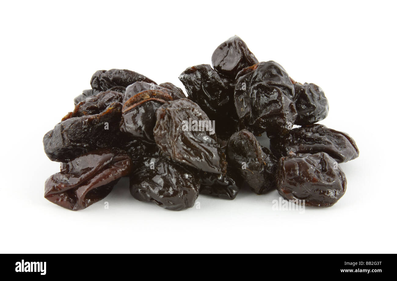 Dried prunes in dark Cut Out Stock Images & Pictures - Alamy
