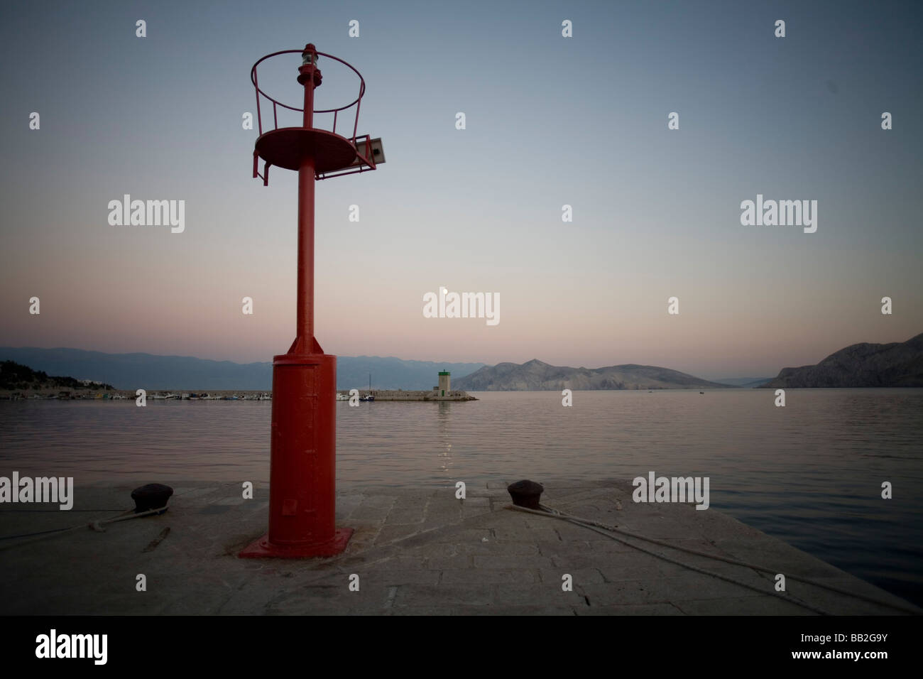 Traveling Croatia; A red light marks the dock Stock Photo - Alamy