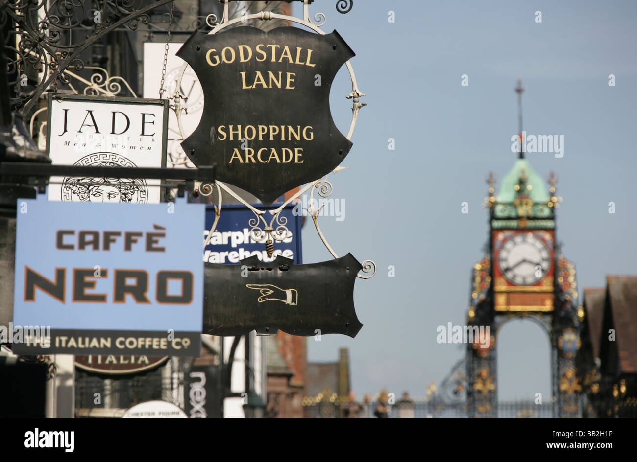 City of Chester, England. Retail and café shop signs on Eastgate Street ...