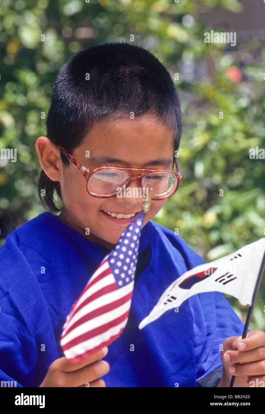 Boy Korea smile pride flag wave America happy display glass Stock Photo ...