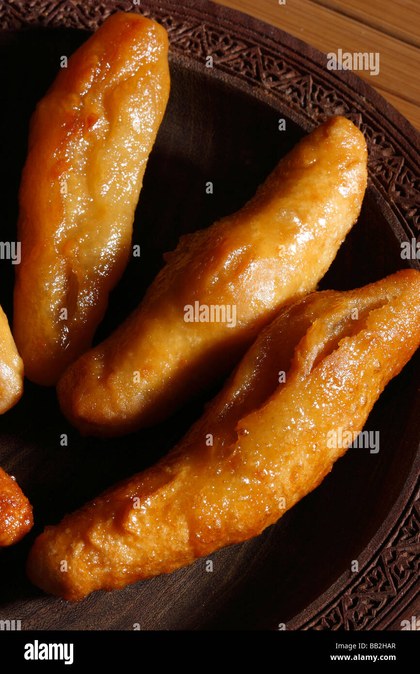 Tosha(Sweet Flour Rolls) - A flour based Dessert made with plain flour ...