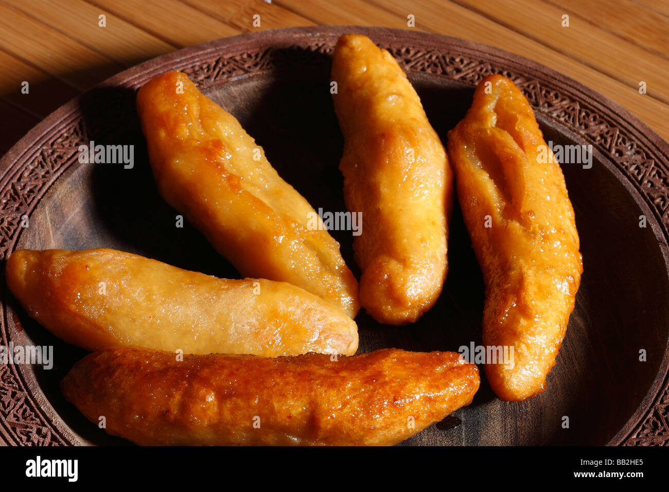 Tosha(Sweet Flour Rolls) - A flour based Dessert made with plain flour ...