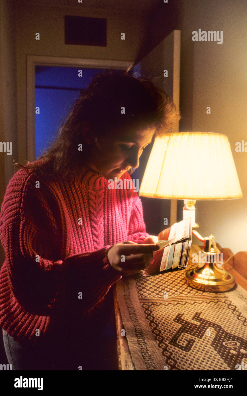 wife woman sneak steal examine wallet husband check spy trust distrust ...