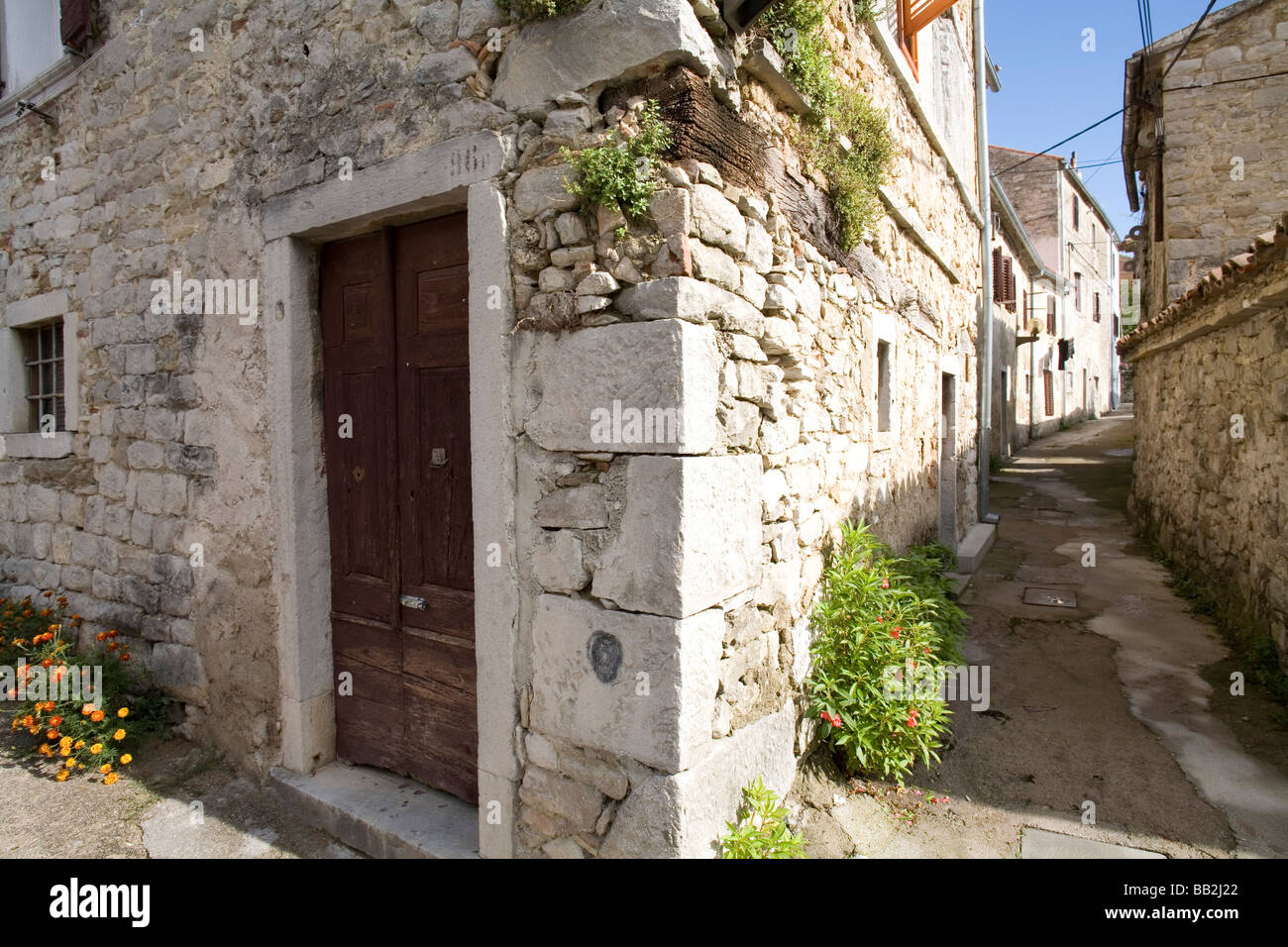 Traveling Croatia; A street of medieval stone buildings in Istria Stock ...