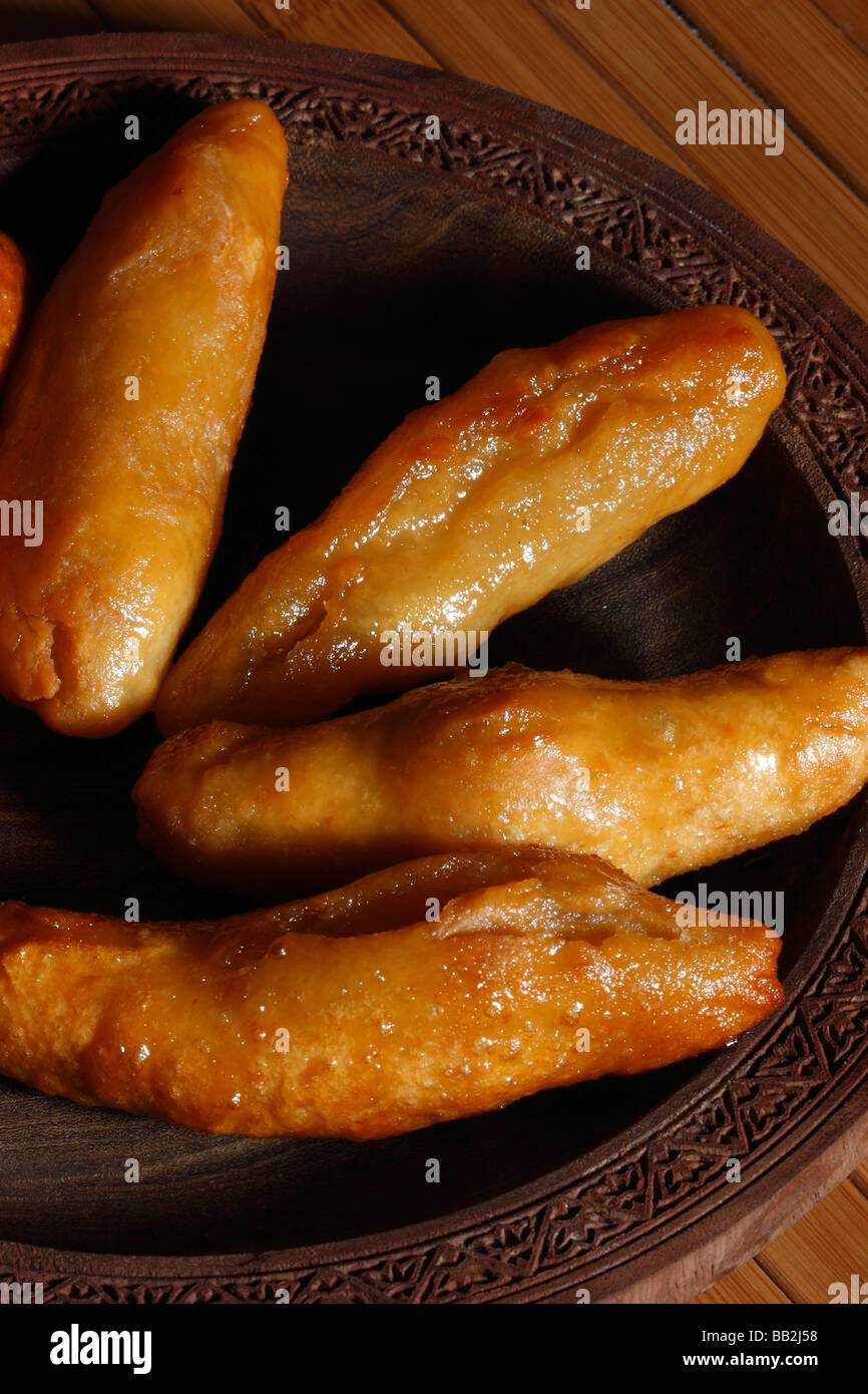 Tosha(Sweet Flour Rolls) - A flour based Dessert made with plain flour ...