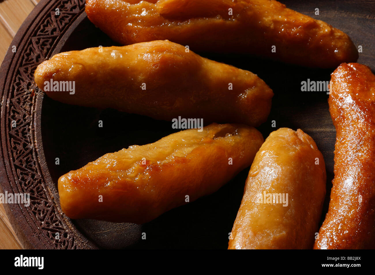 Tosha(Sweet Flour Rolls) - A flour based Dessert made with plain flour ...