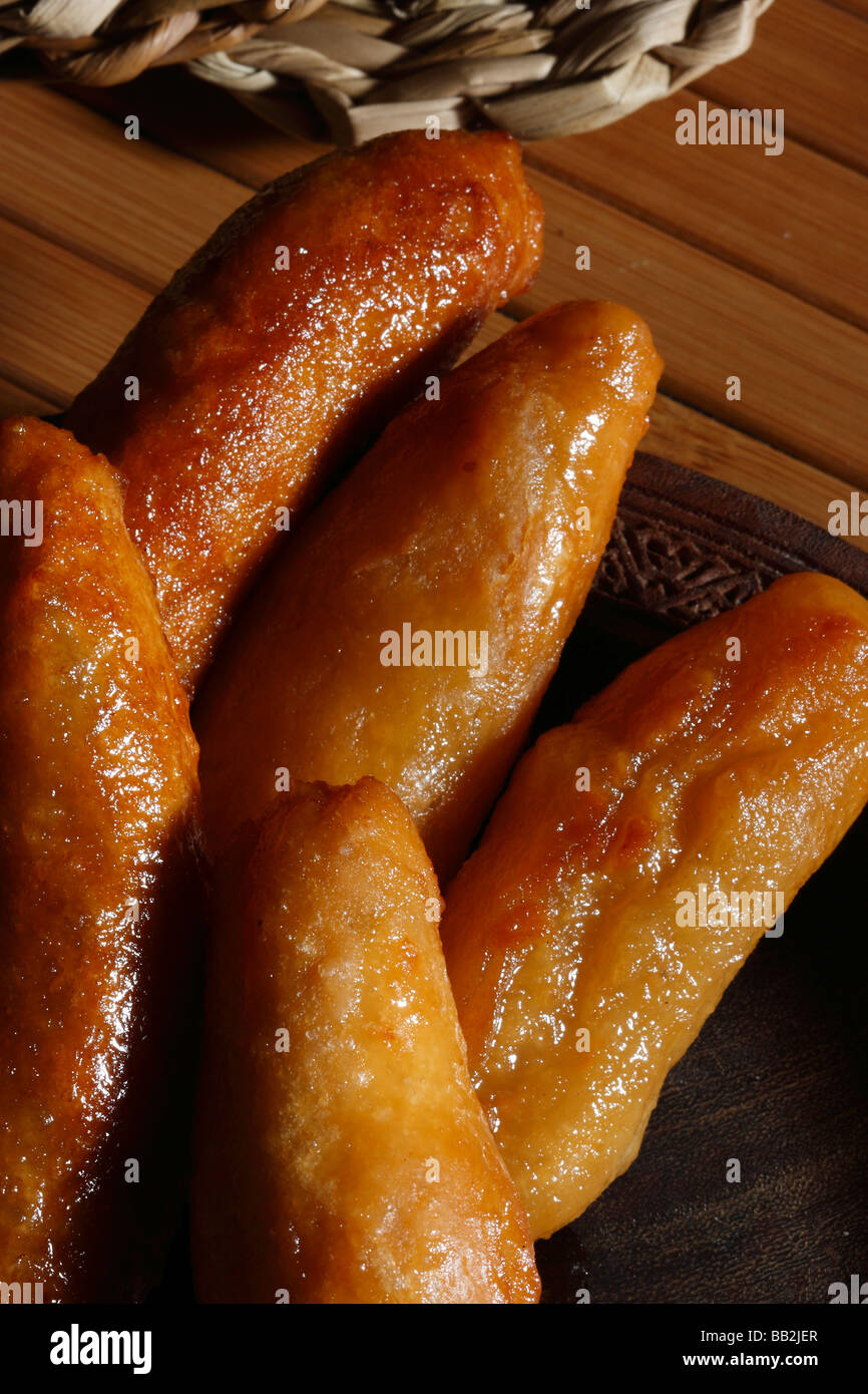 Tosha(Sweet Flour Rolls) - A flour based Dessert made with plain flour ...