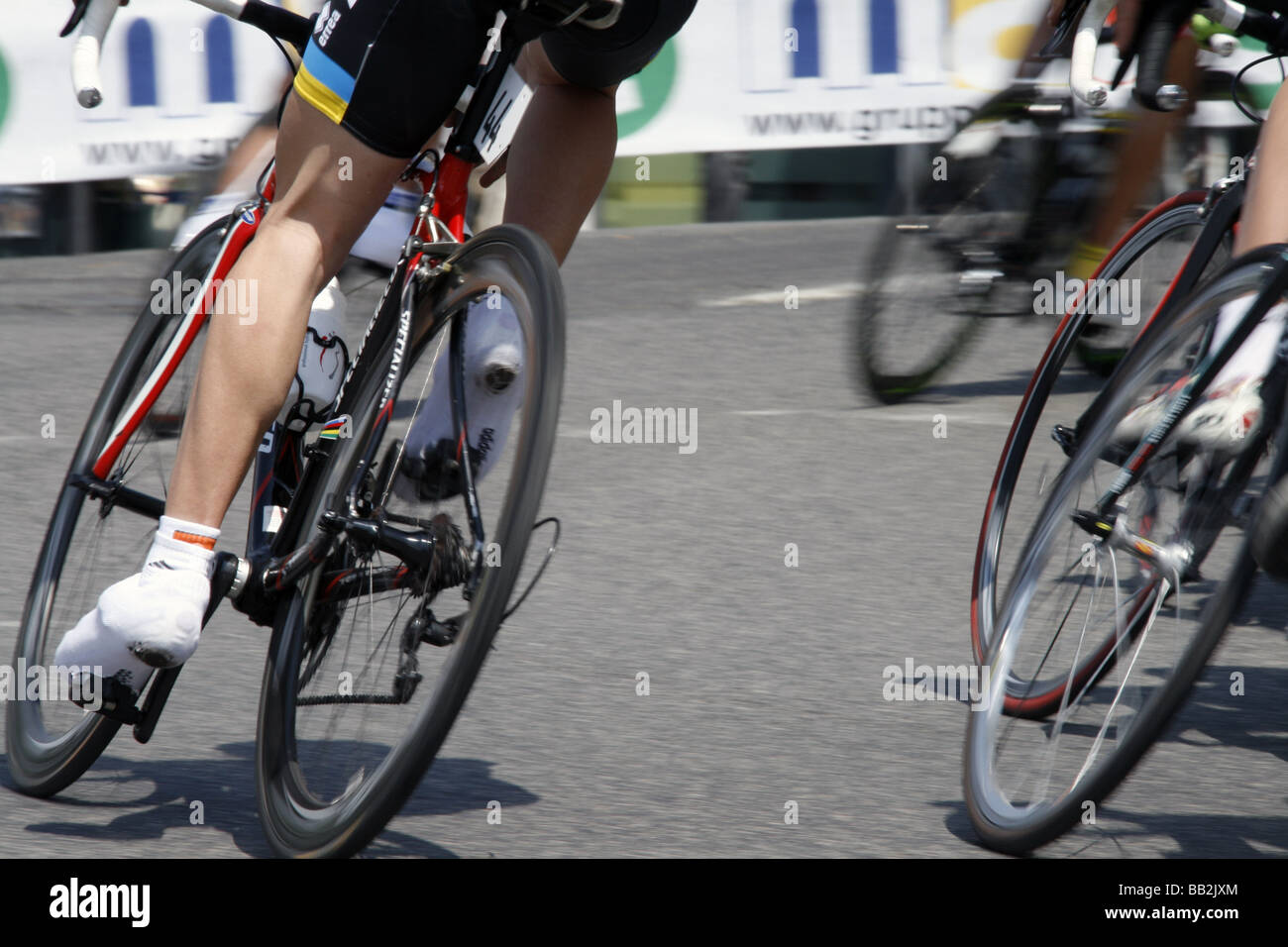 professional bike riders in road street race in city town Stock Photo ...