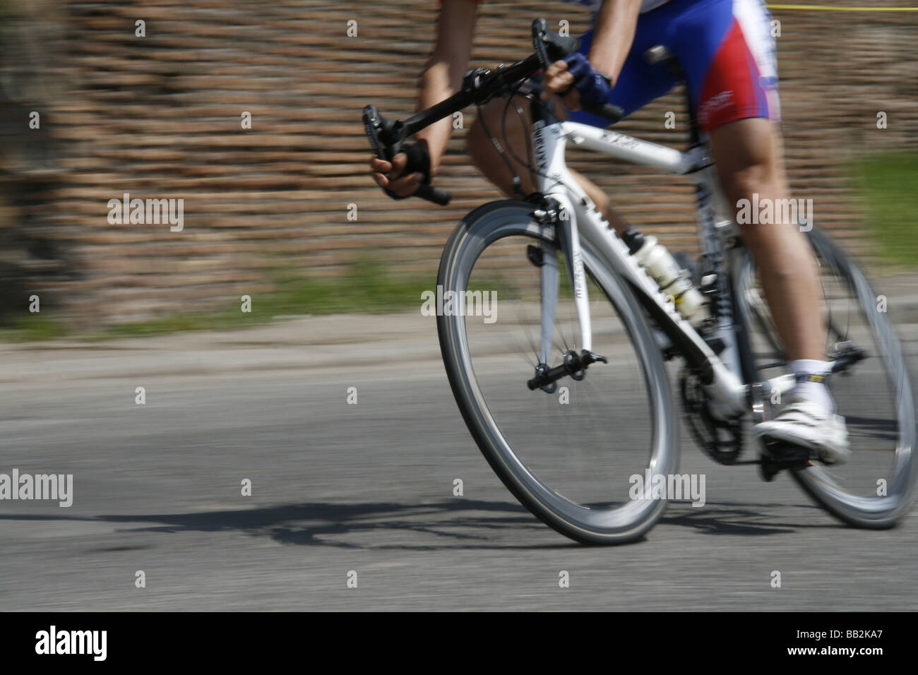 professional bike rider in road street race in city town Stock Photo ...