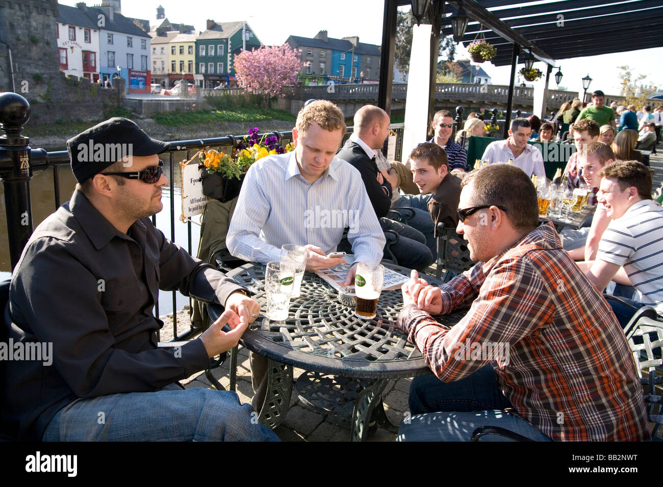 Men drinking in Ireland Stock Photo - Alamy