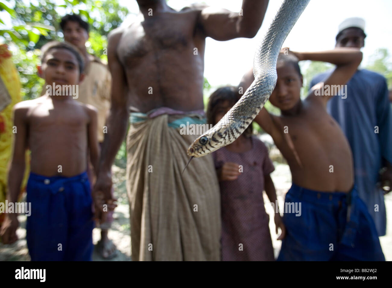 Children with snake hi-res stock photography and images - Alamy