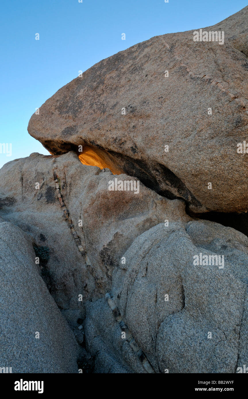 sunlight sun illuminate shine shining through crack rock formation ...