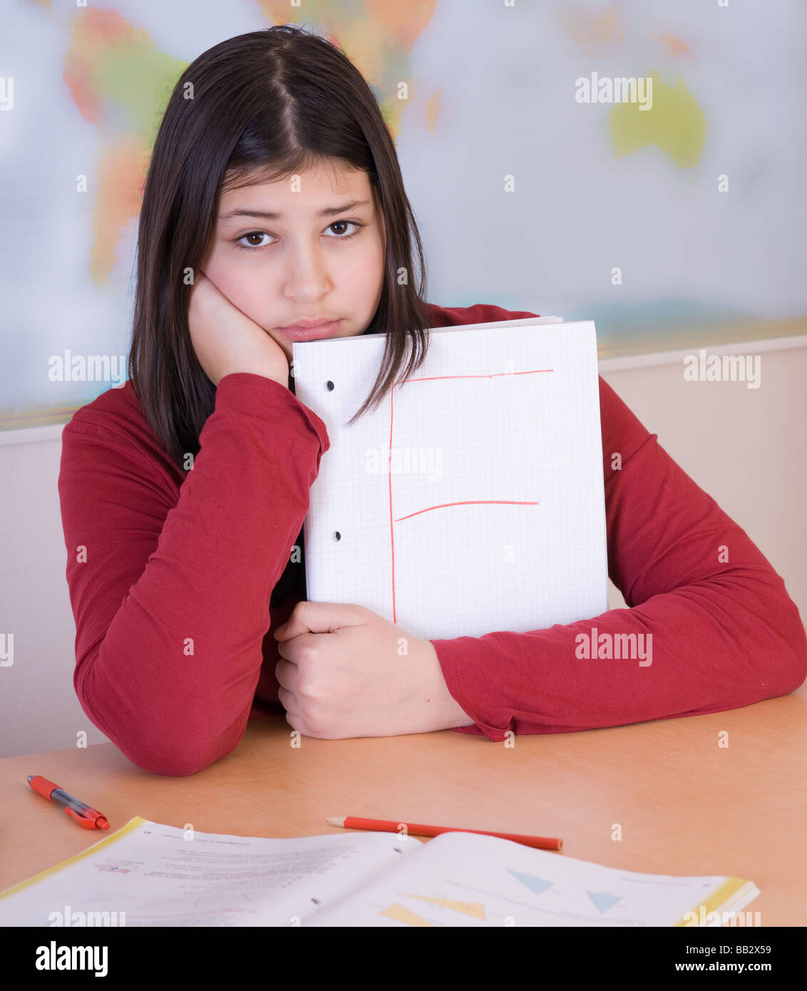 Teen girl sad about failing her grade Stock Photo - Alamy