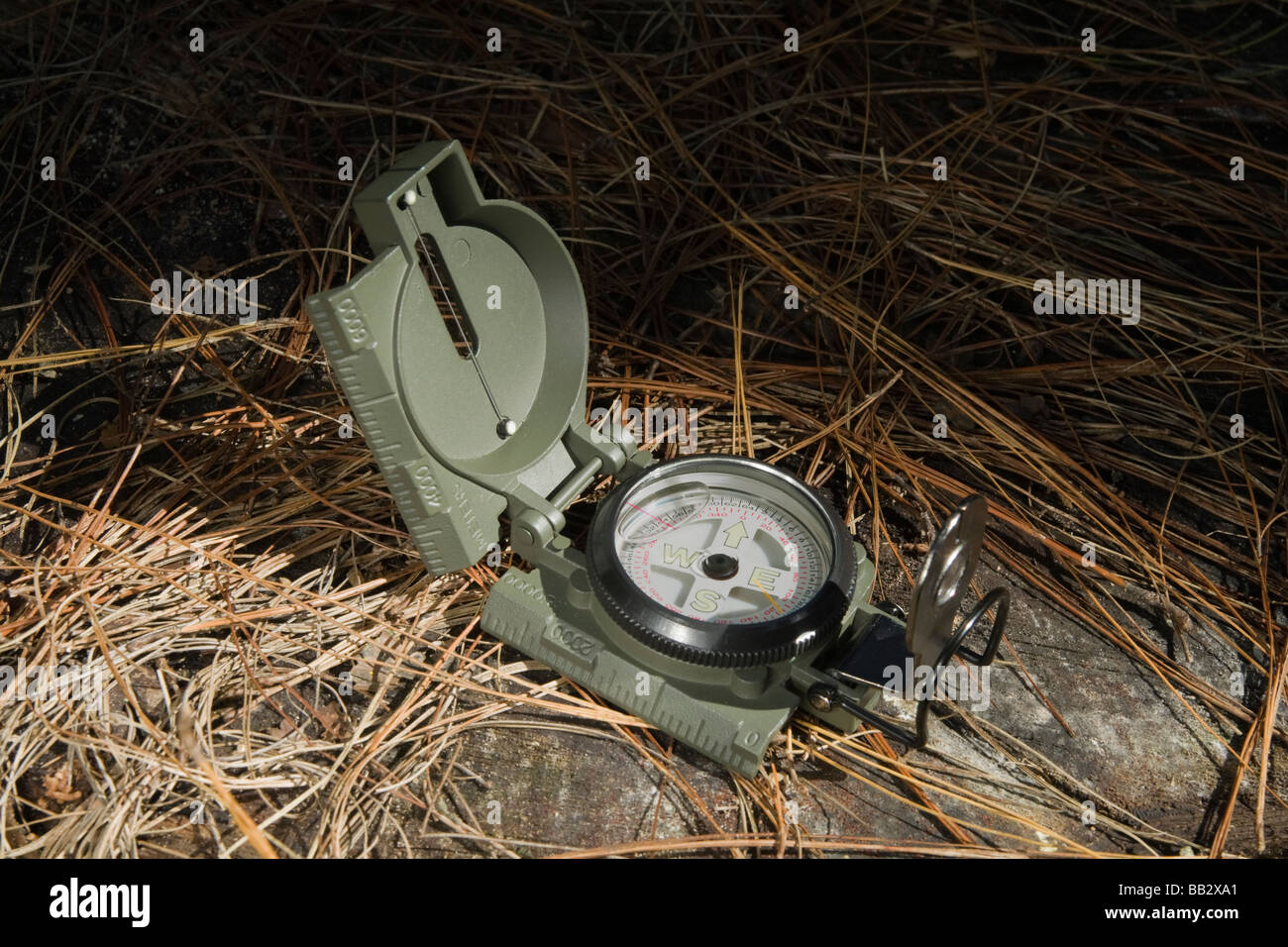 Lensatic compass in rugged terrain Stock Photo - Alamy