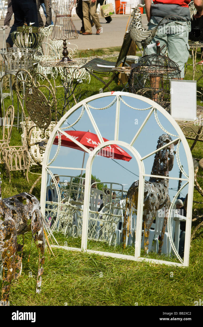 Garden mirror and objects at a garden show Stock Photo - Alamy