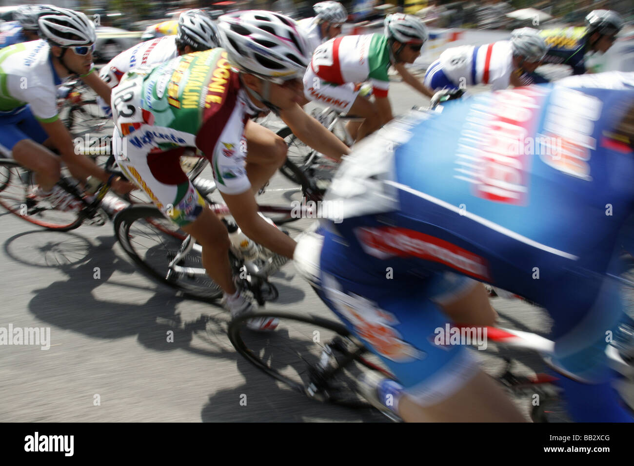 professional bike riders in road street race in city town Stock Photo ...