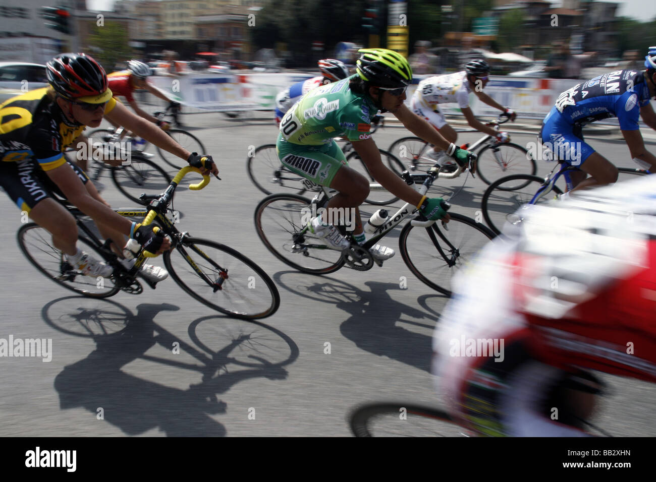 professional bike riders in road street race in city town Stock Photo ...