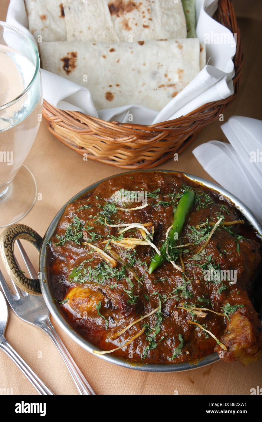 Rajasthani boneless diced chicken hi-res stock photography and images ...