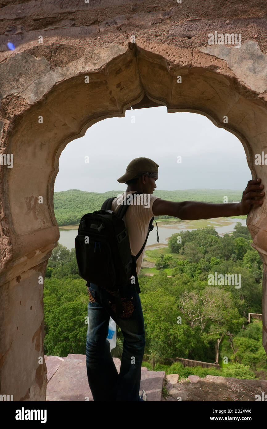 A guide showing the scenic view of Ranthambhore National Park, from ...