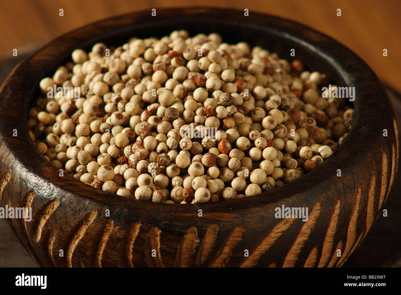 white pepper corn are ripened longer and then soaked in a water ...