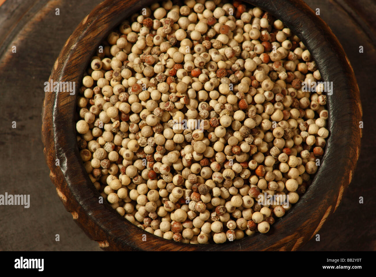 white pepper corn are ripened longer and then soaked in a water ...