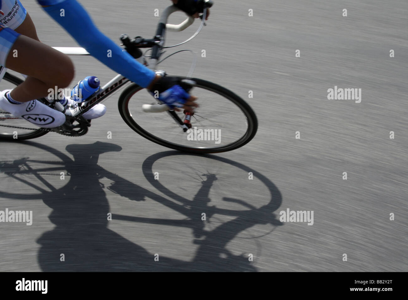 professional bike rider in road street race in city town Stock Photo ...