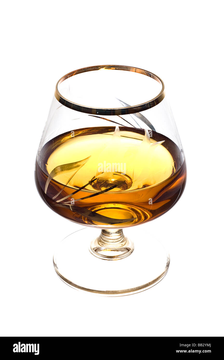 Glass of cognac isolated on white background Stock Photo - Alamy