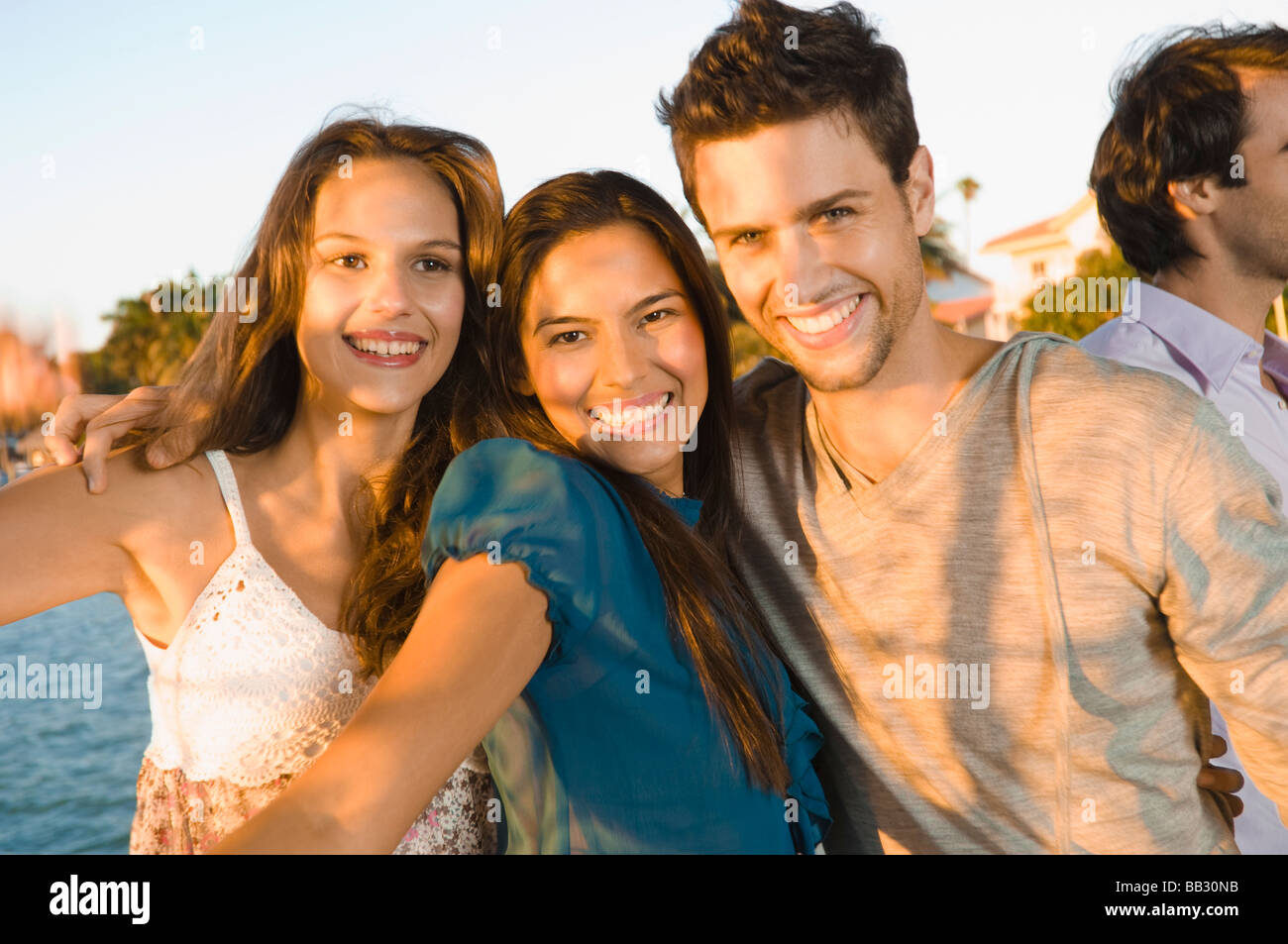 Portrait of three friends smiling Stock Photo - Alamy