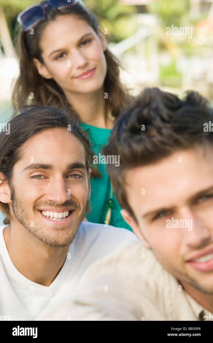 Portrait of three friends smiling Stock Photo - Alamy