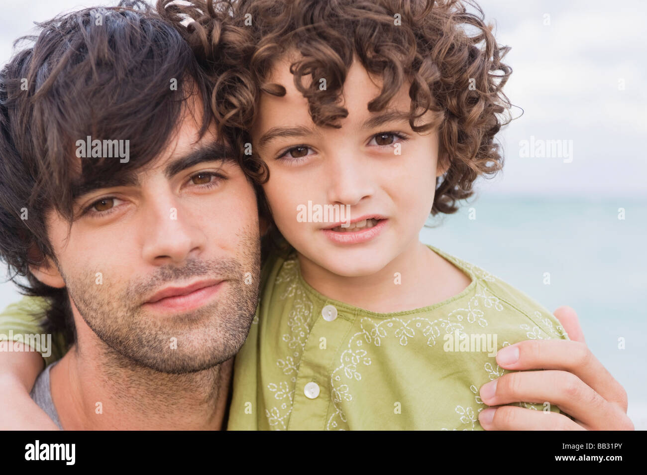 Portrait of a man with his son Stock Photo - Alamy