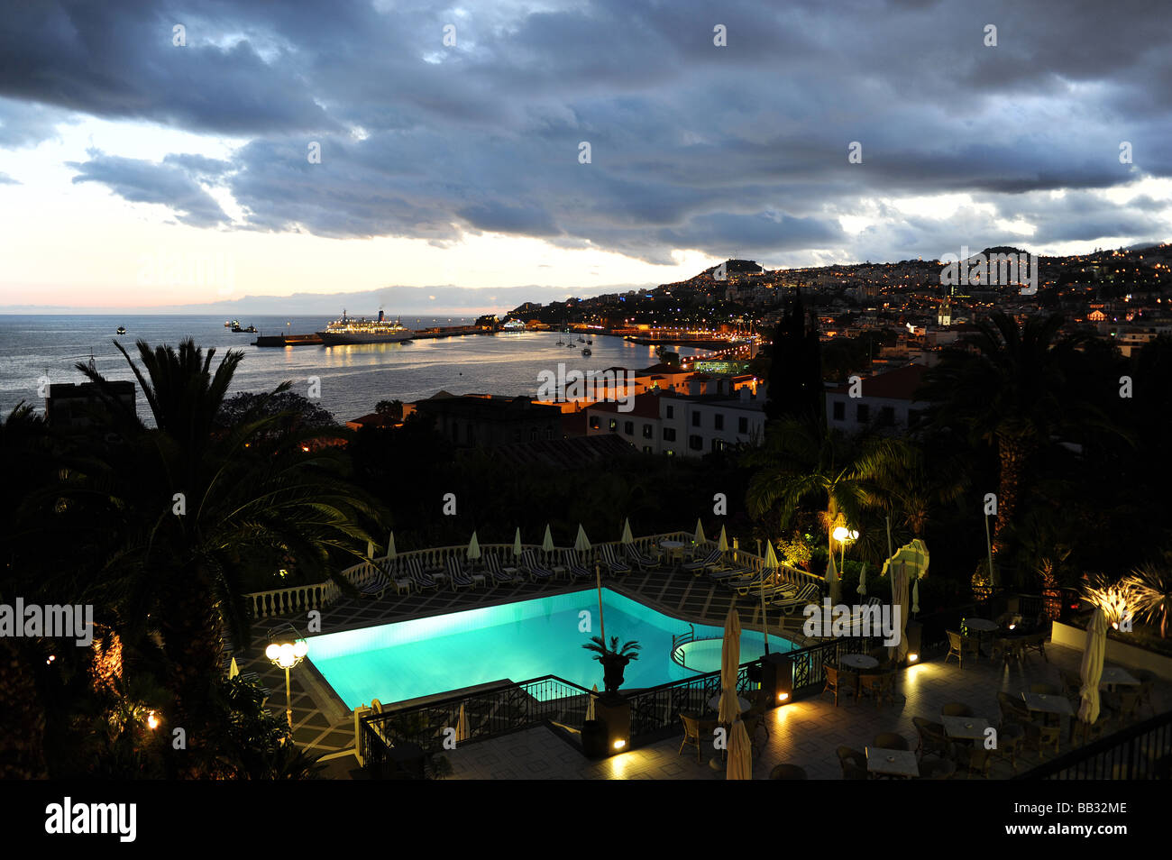 Funchal harbour as night falls. Madeira Stock Photo - Alamy