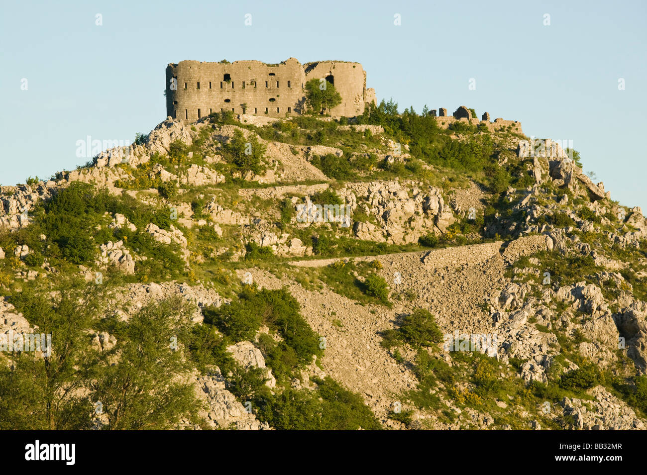 Montenegro, Kosmac. Castle ruins at Sunset Stock Photo - Alamy