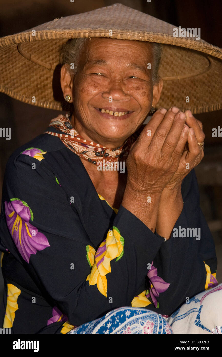 Indonesia, Java, Karimun Jawa Island and Marine Park. Woman at market ...