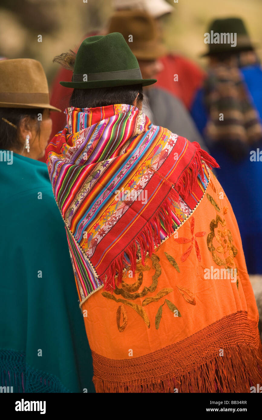 South America Ecuador woman in traditional hat & shawl at weekly market ...