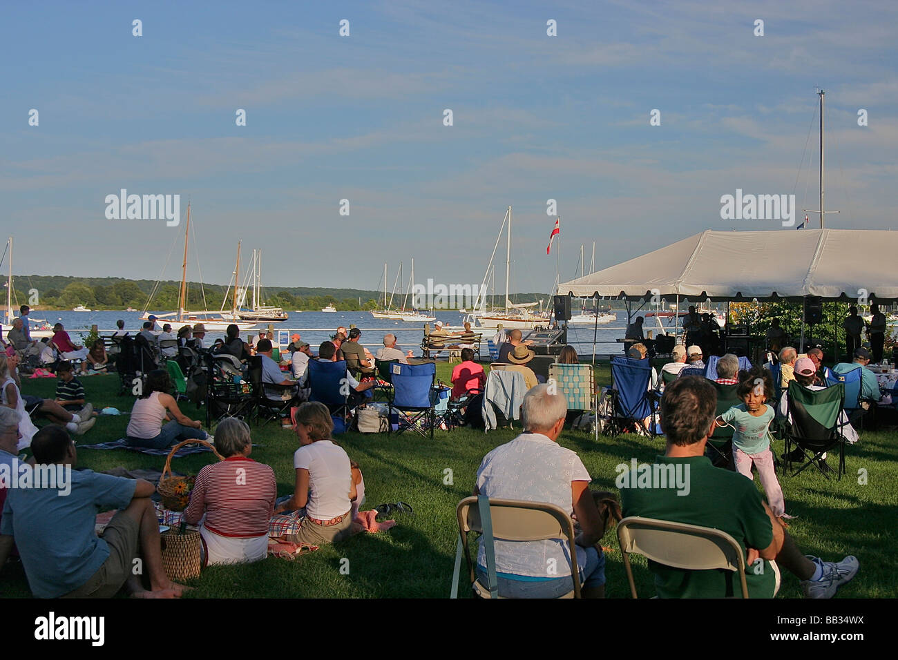 North America, USA, Connecticut, Essex. People listen to music at a ...